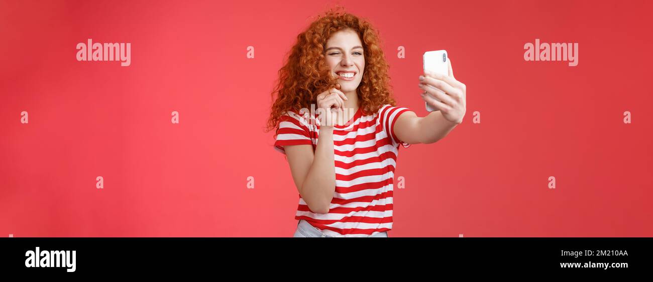 Sassy good-looking stylish charismatic redhead female curly hairstyle ...