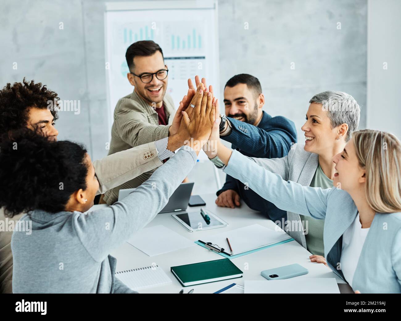 businessman businesswoman success young business team high five support unity celebrating give ...