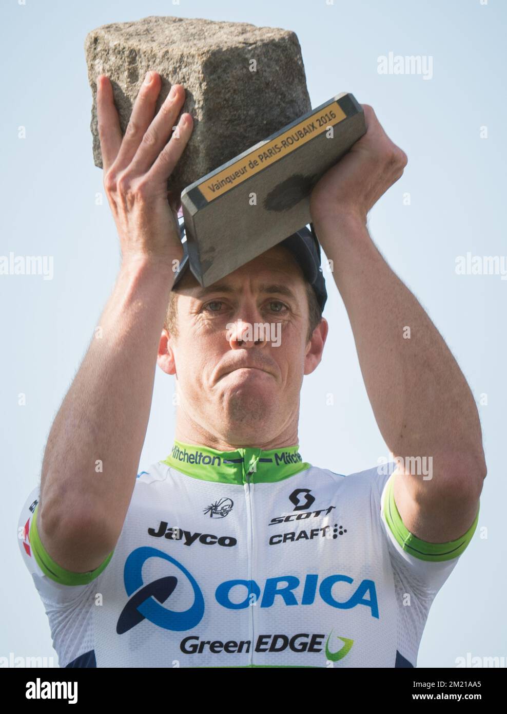 Australian Mathew Hayman of Orica GreenEDGE celebrates on podium after ...