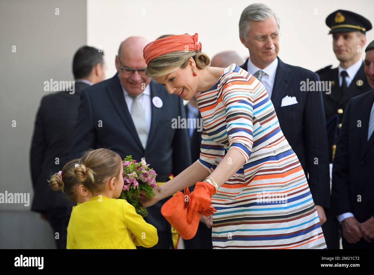 Queen Mathilde of Belgium is welcomed by children as she arrives for a ...
