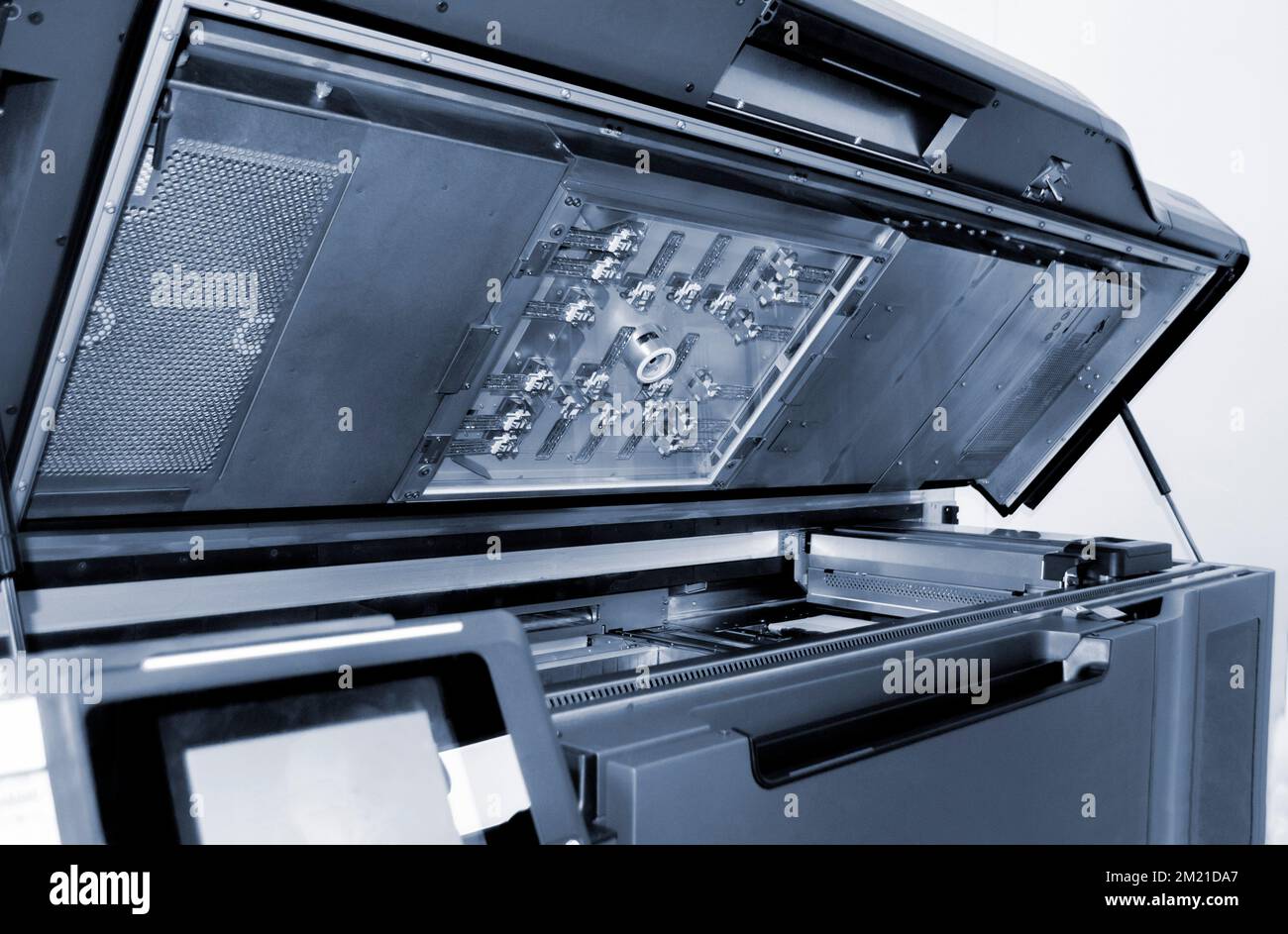 Top of large industrial printer with lid open. Multi Jet Fusion. Large ...