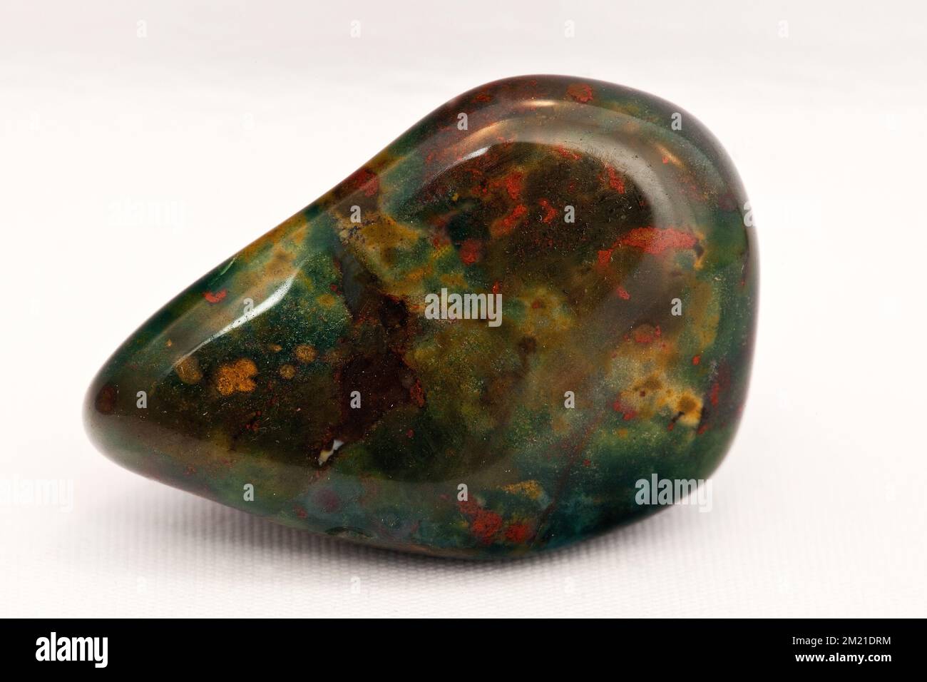 Macro close up colour photograph of a polished "Bloodstone" a semi ...