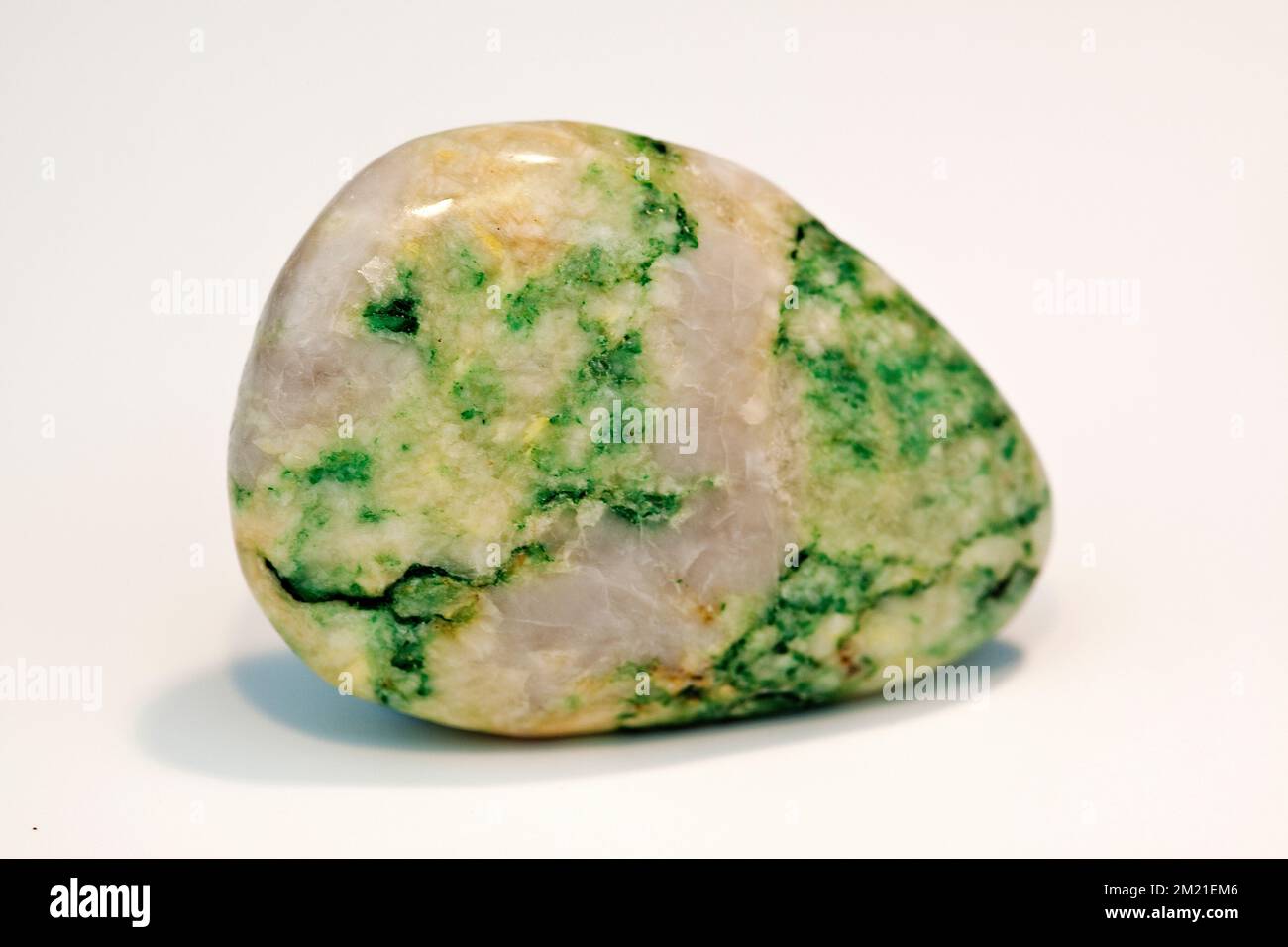 Macro shot a close up colour photograph of a polished 'Mariposite' a ...