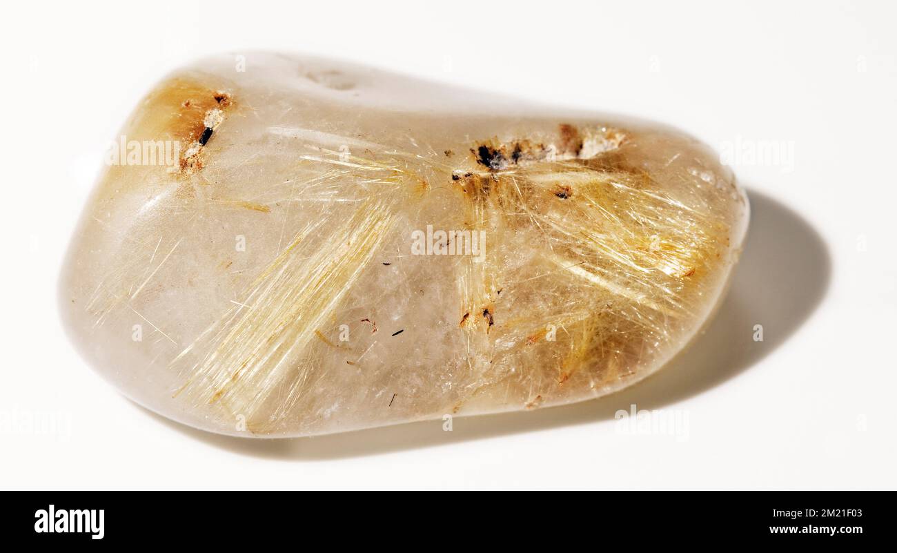 Macro close up colour photograph of 'Rutilated Quartz' a semi precious ...