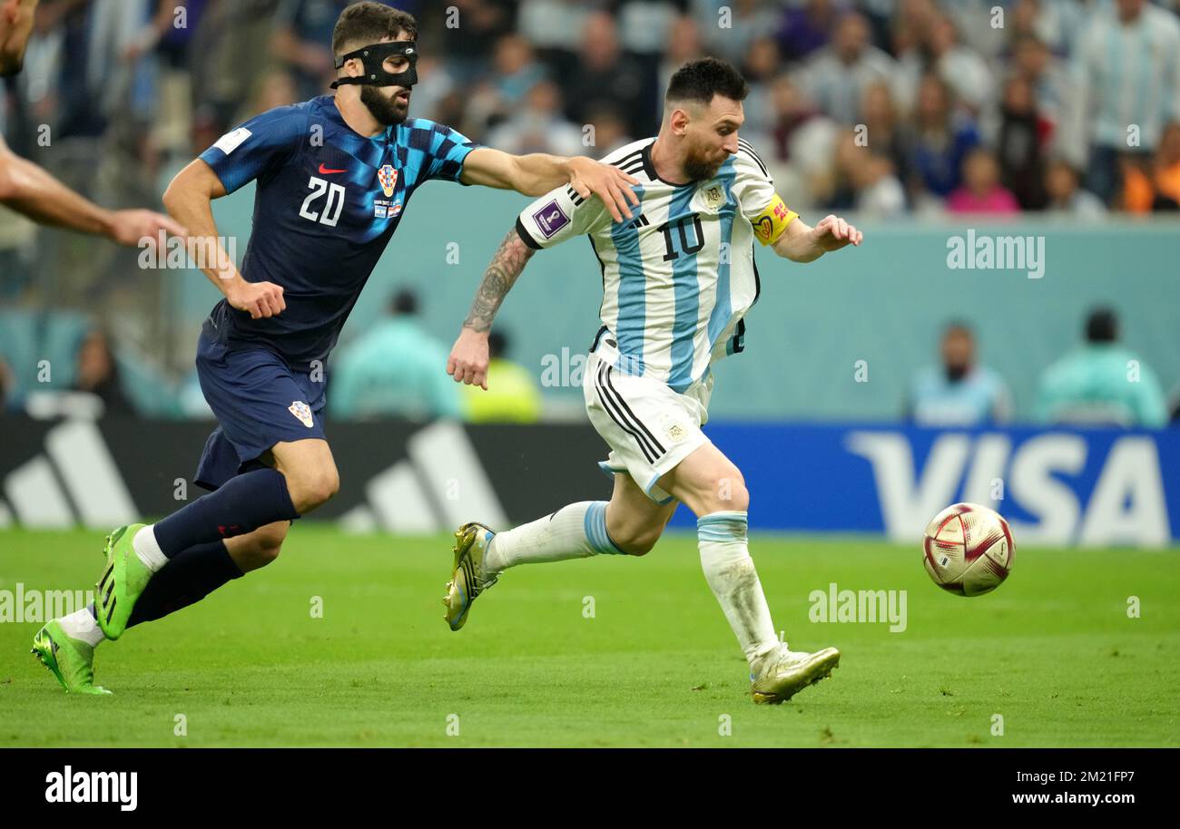 Croatia's Josko Gvardiol (left) and Argentina's Lionel Messi battle for ...