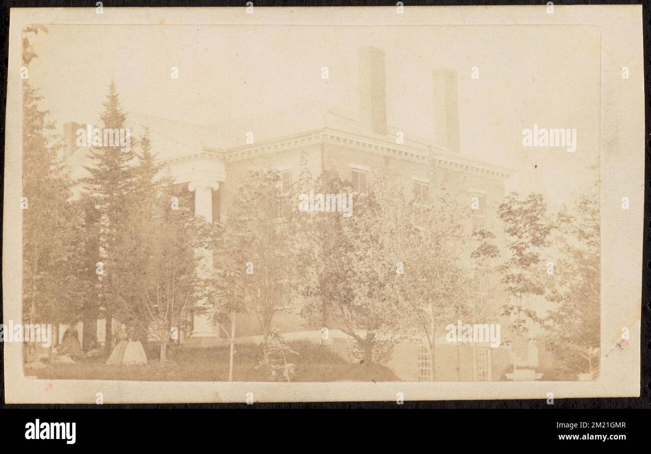Building with two chimney stacks photographed through trees , Buildings ...