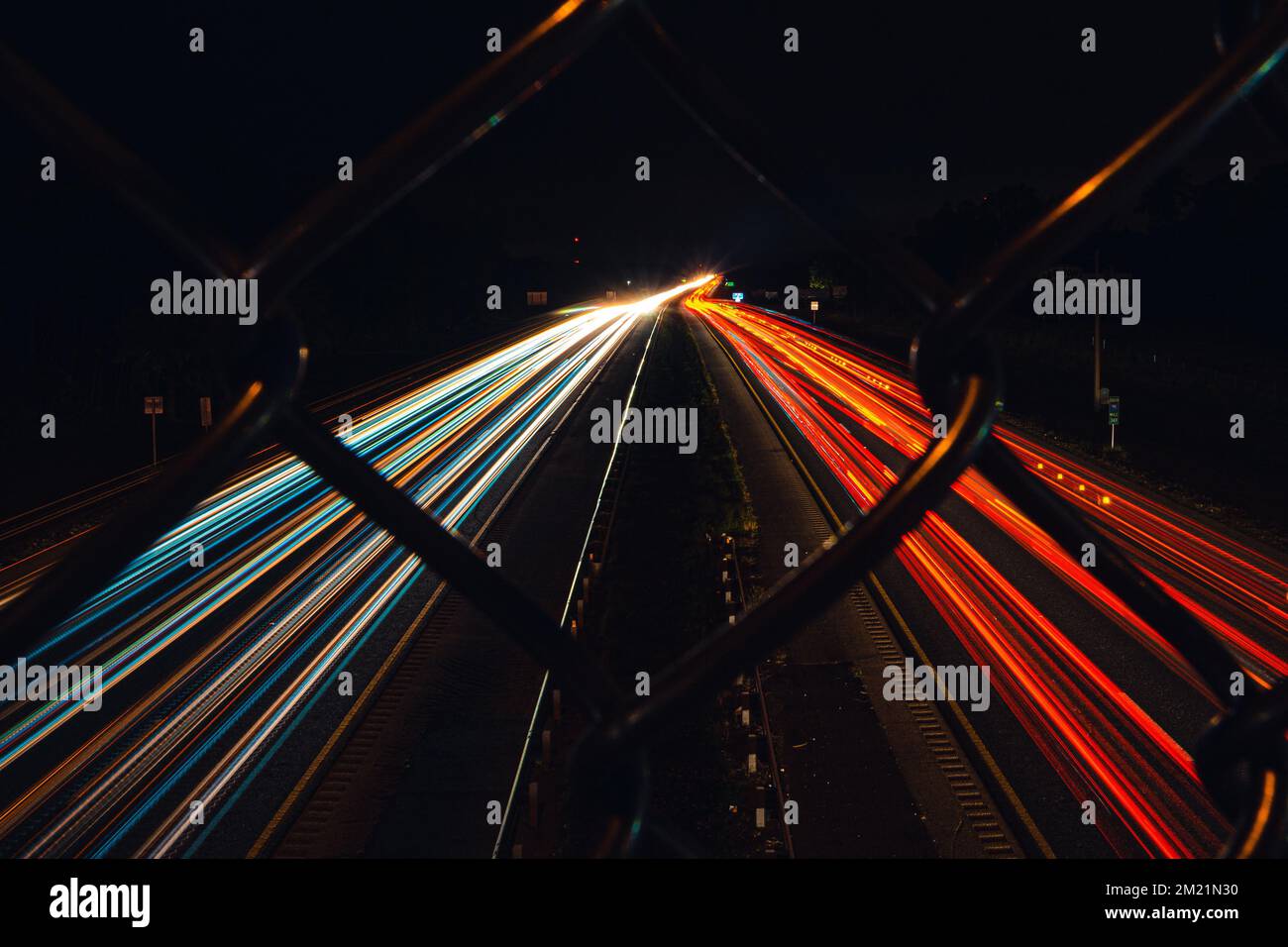 light trails over the interstate at night - traffic Stock Photo - Alamy