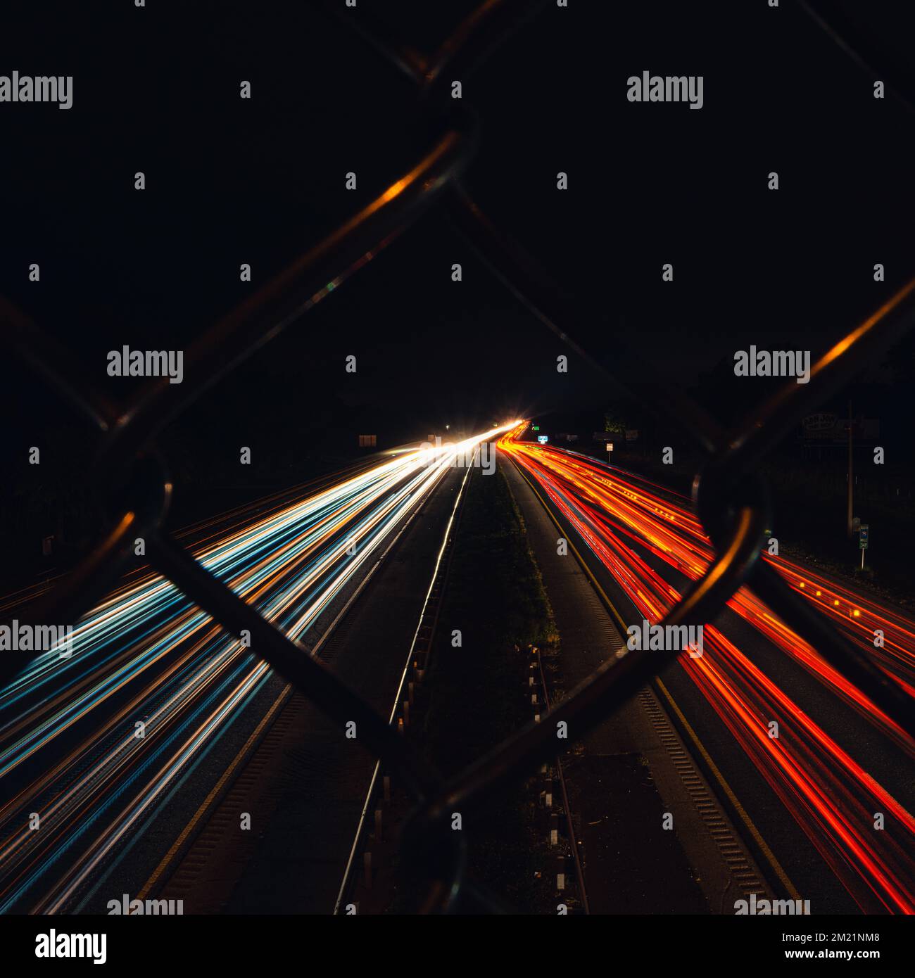 light trails over the interstate at night - traffic Stock Photo - Alamy