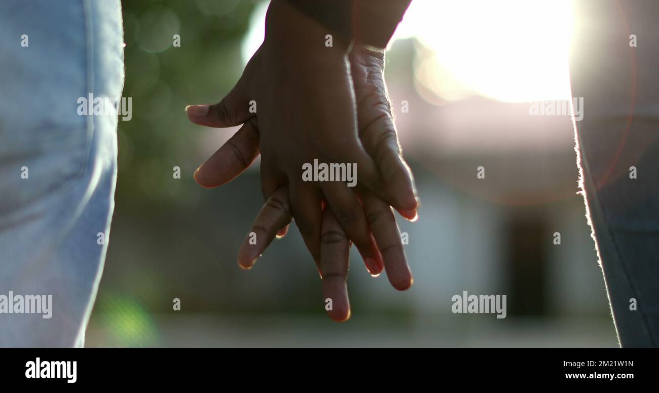 Black couple holding hands outside, two people hold hand Stock Photo ...
