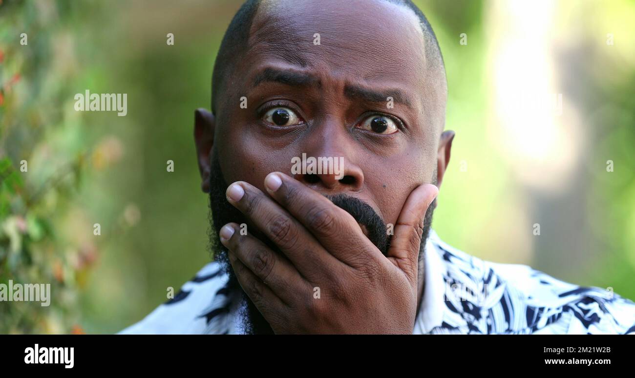 Black man SHOCK terror emotion. unbelief African person in DESPAIR ...