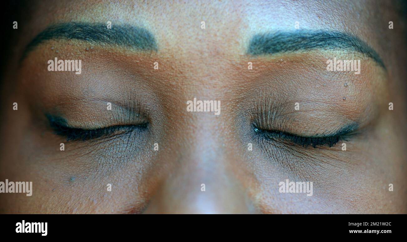 African female eyes opening close hi-res stock photography and images ...