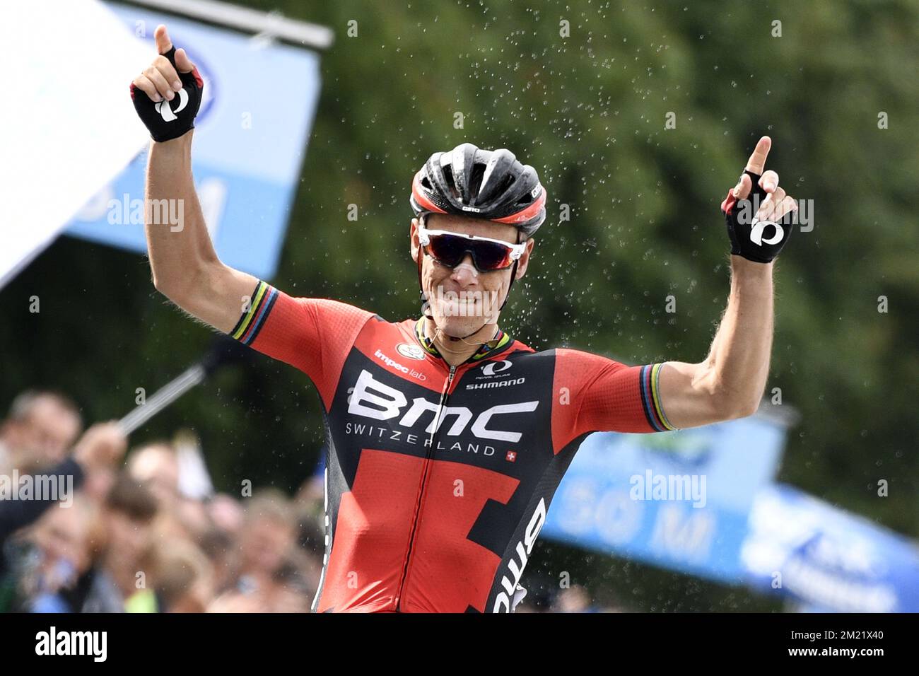 Belgian Philippe Gilbert of BMC Racing Team crosses the finish line to ...