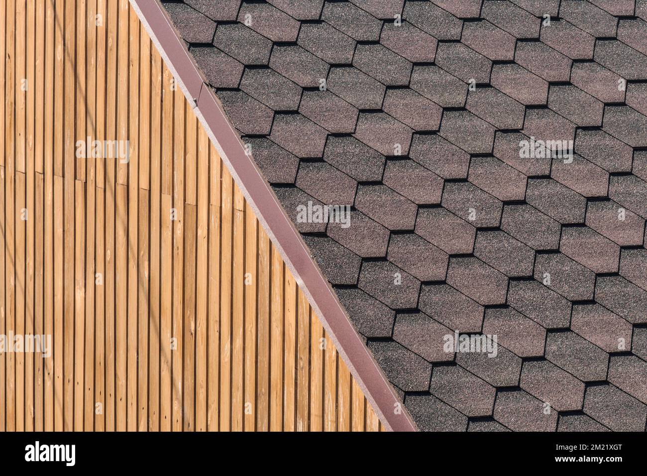 Modern building roofing element with tiled roof and wood wall facade ...