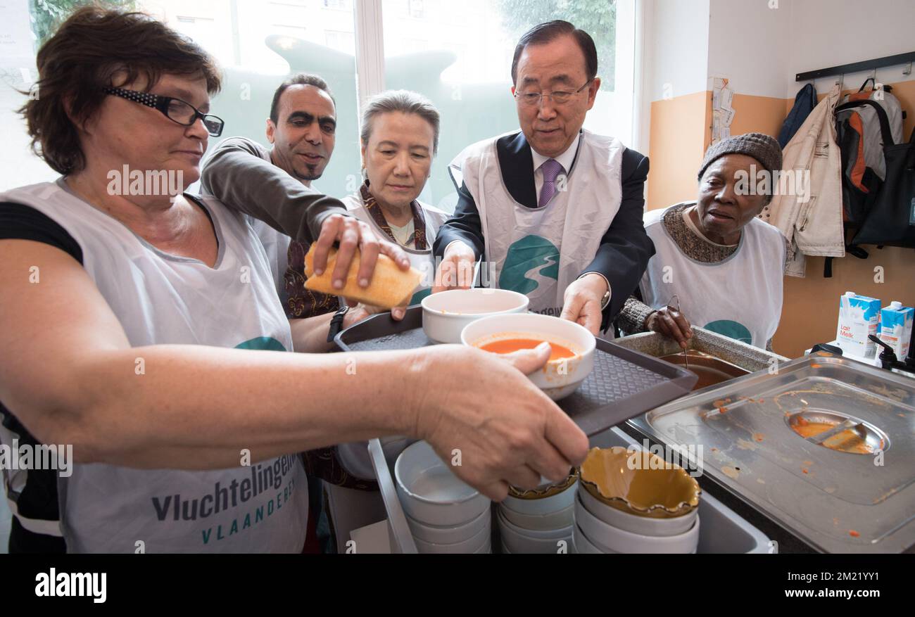 UN Secretary-General Ban Ki-moon, his wife Yoo Soon-taek (C), volunteer ...
