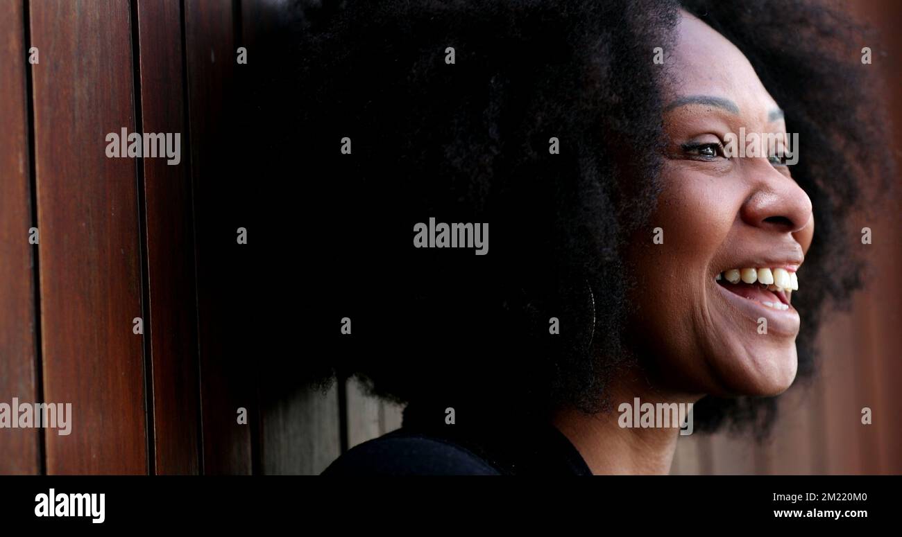 Black woman natural real lfe laugh, person laughter covering mouth with ...
