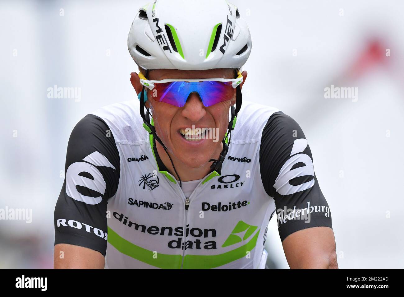 Belgian Serge Pauwels of Dimension Data crosses the finish line at the ...