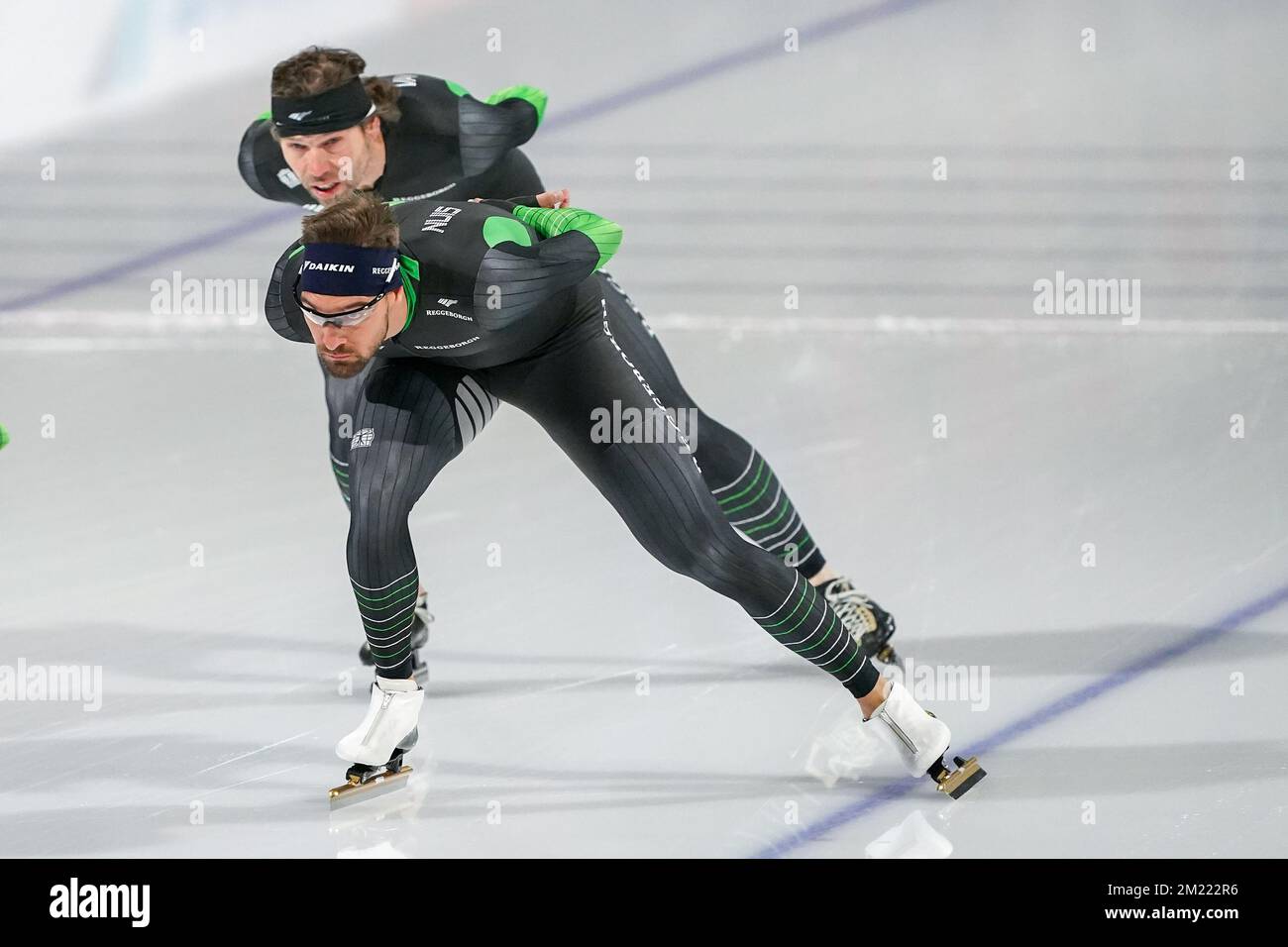 CALGARY, CANADA - DECEMBER 13: Kjeld Nuis of Team Reggeborgh, coach Gerard van Velde of Team ...