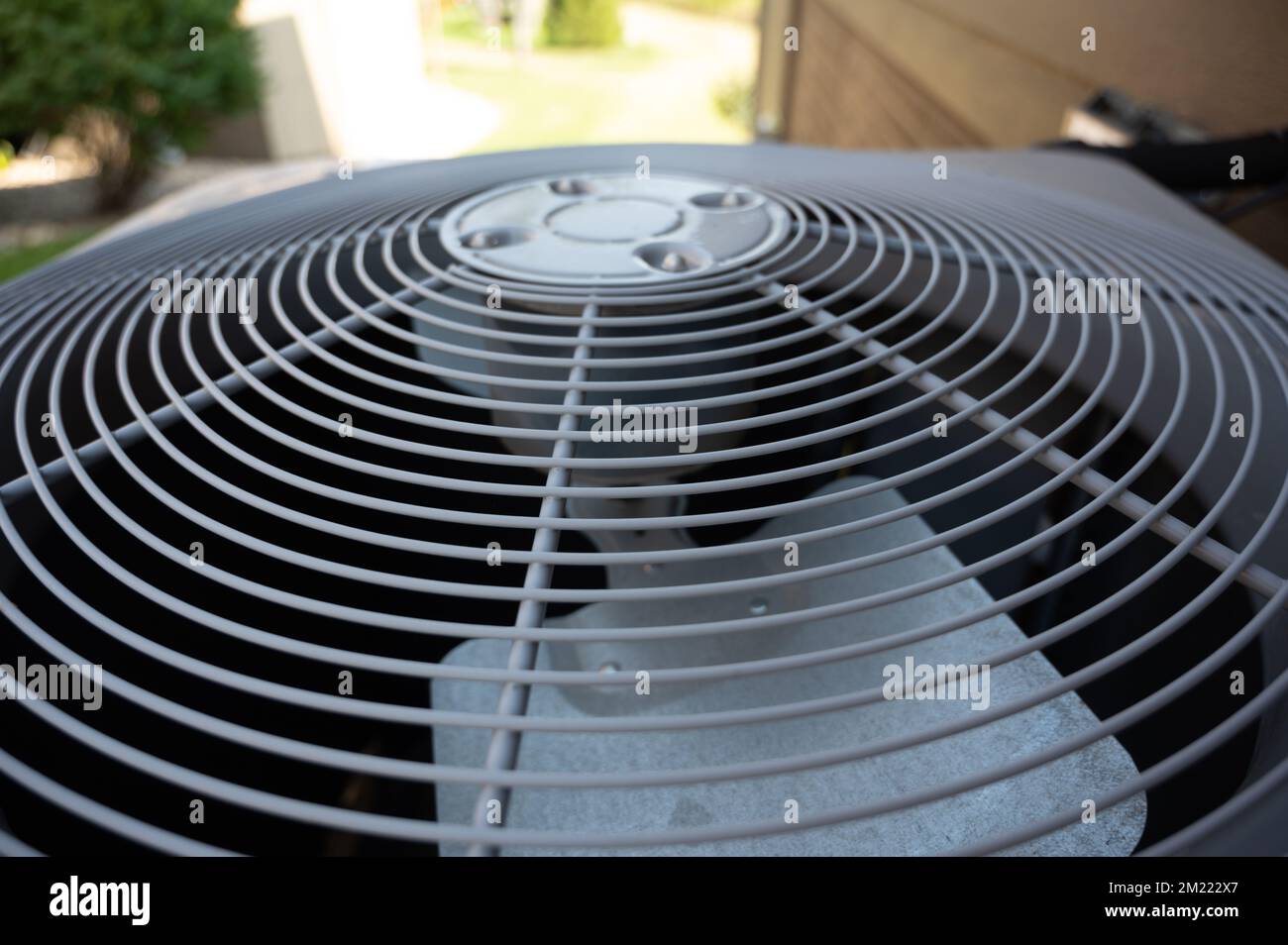 Top view of Residential air conditioning unit outdoors with fan and ...