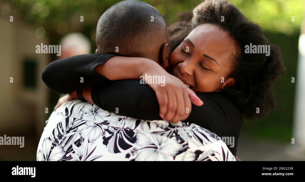 Happy couple hugging outside, two people embrace Stock Photo - Alamy