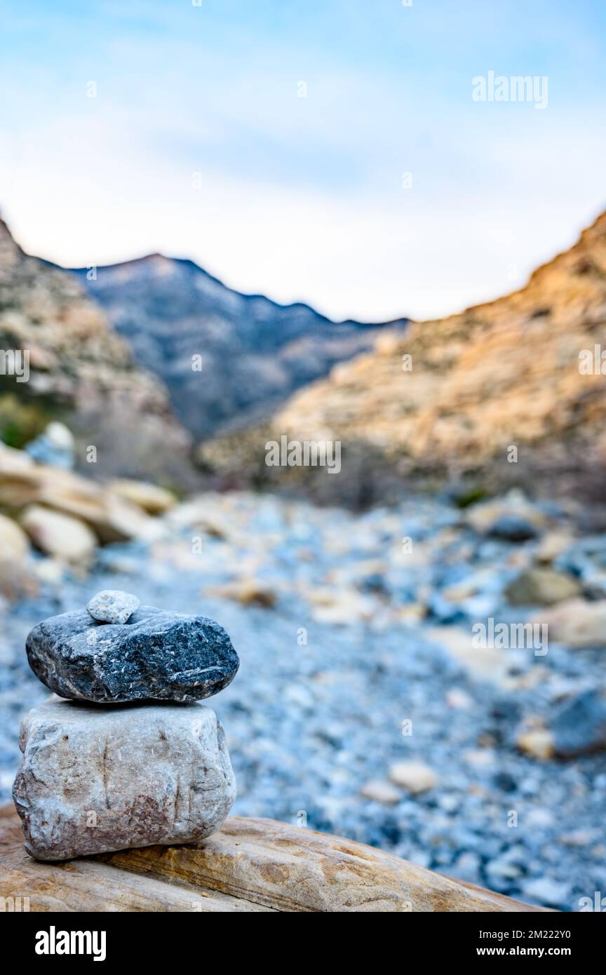 Rocks balanced on top of each other on mountain trail Stock Photo - Alamy