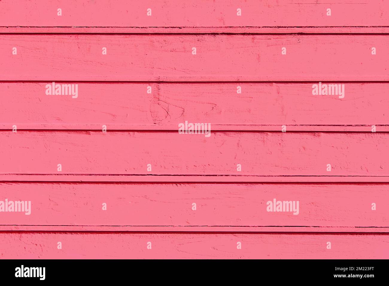Horizontal boards in light red crimson color paint wooden surface ...
