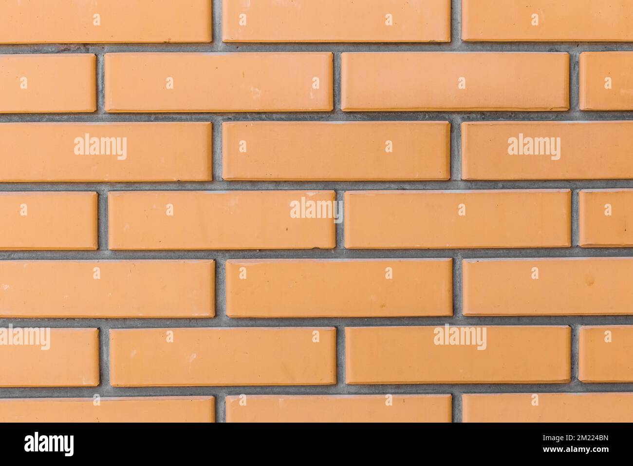 Light orange brick blocks wall texture background Stock Photo - Alamy