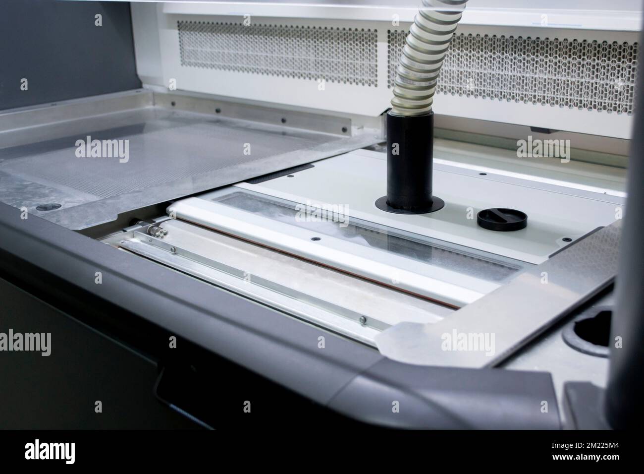 Powder part of 3d printer. Process of pouring polyamide powder through ...