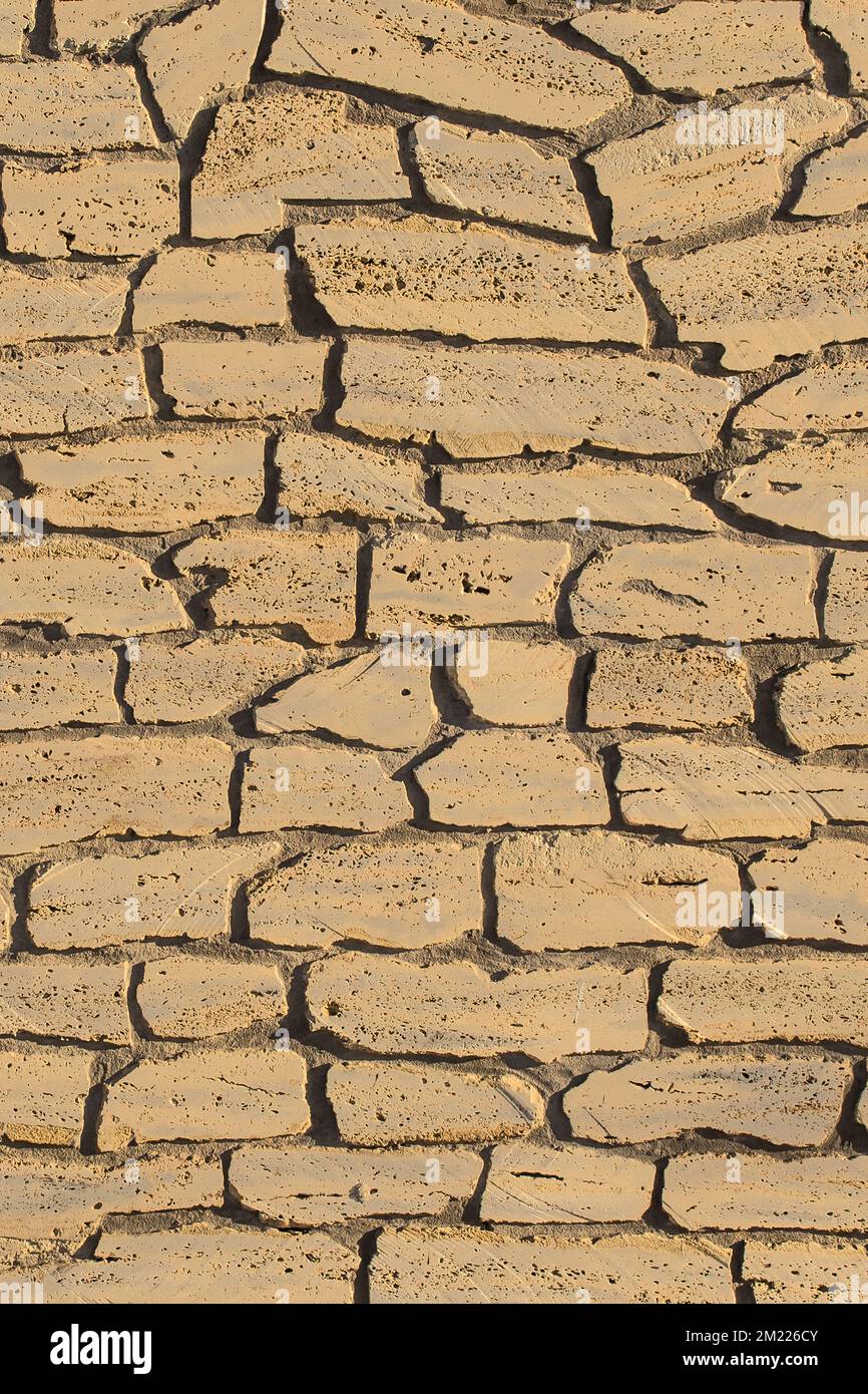 Sand color stone brick beige vertical wall, modern texture ancient ...