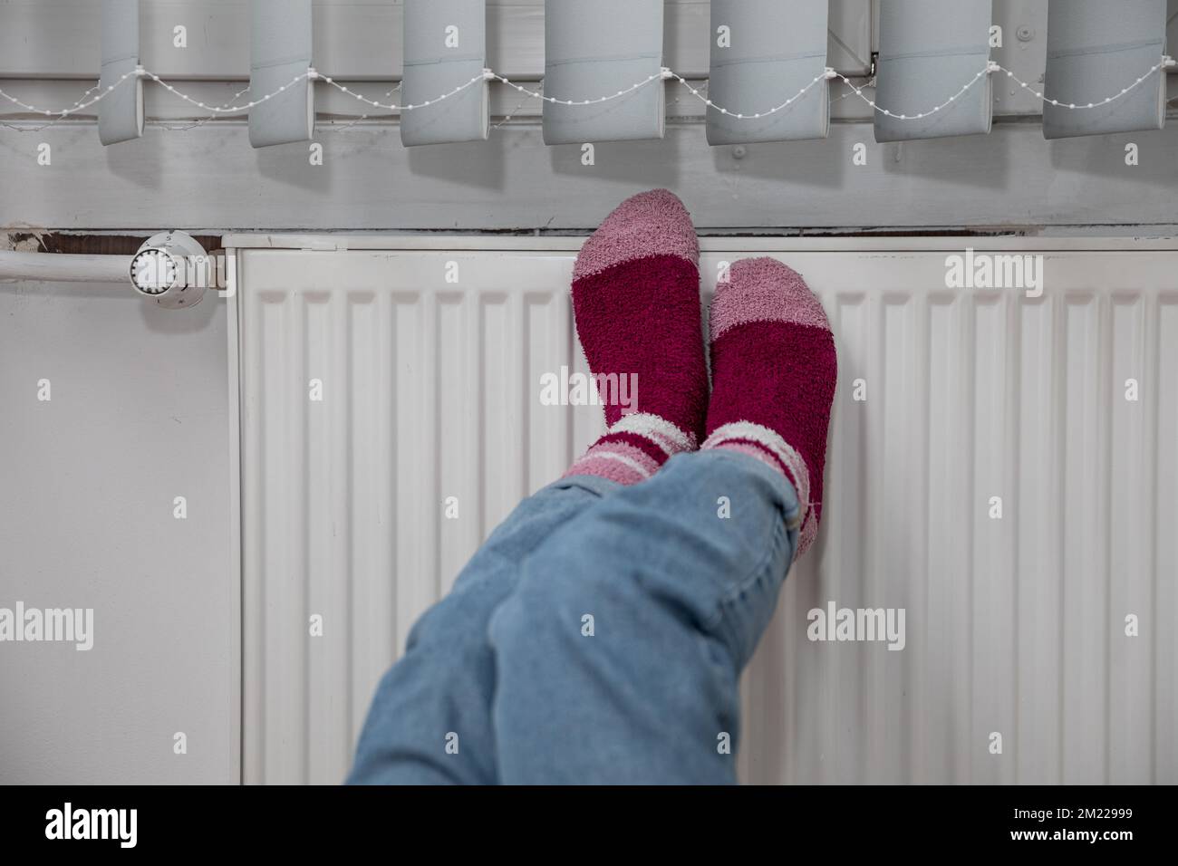 Feet on a radiator hi-res stock photography and images - Alamy