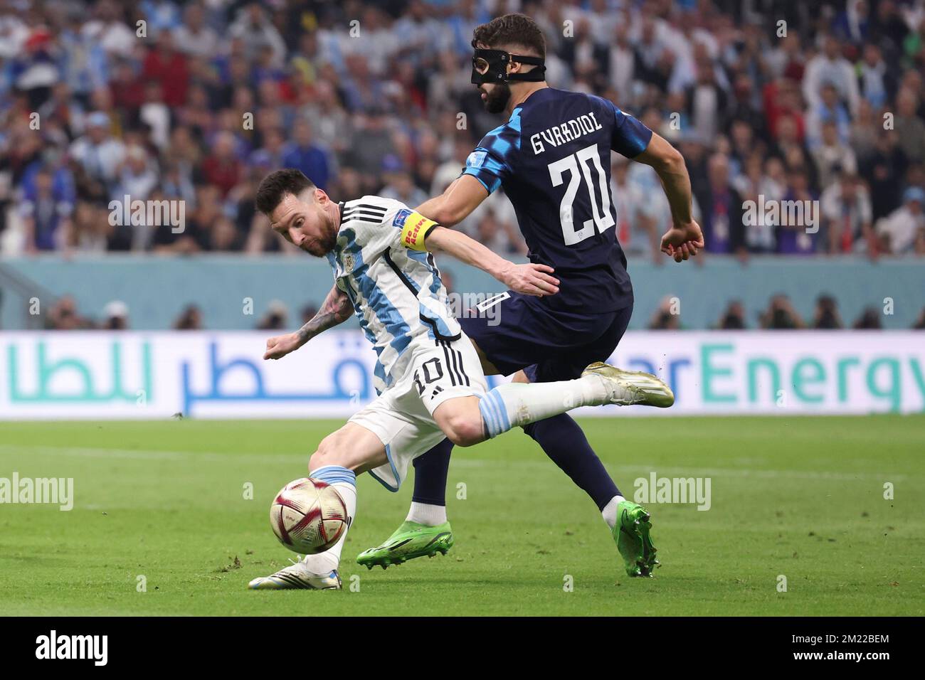 Lusail, Qatar. 13th Dec, 2022. Lionel Messi (L) of Argentina vies with ...