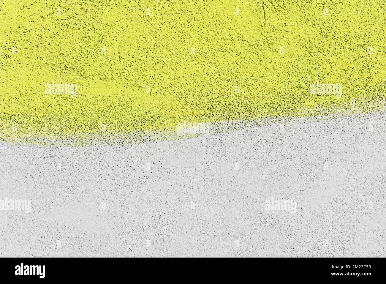 Wall two tone colors: yellow and white paint on concrete surface design ...