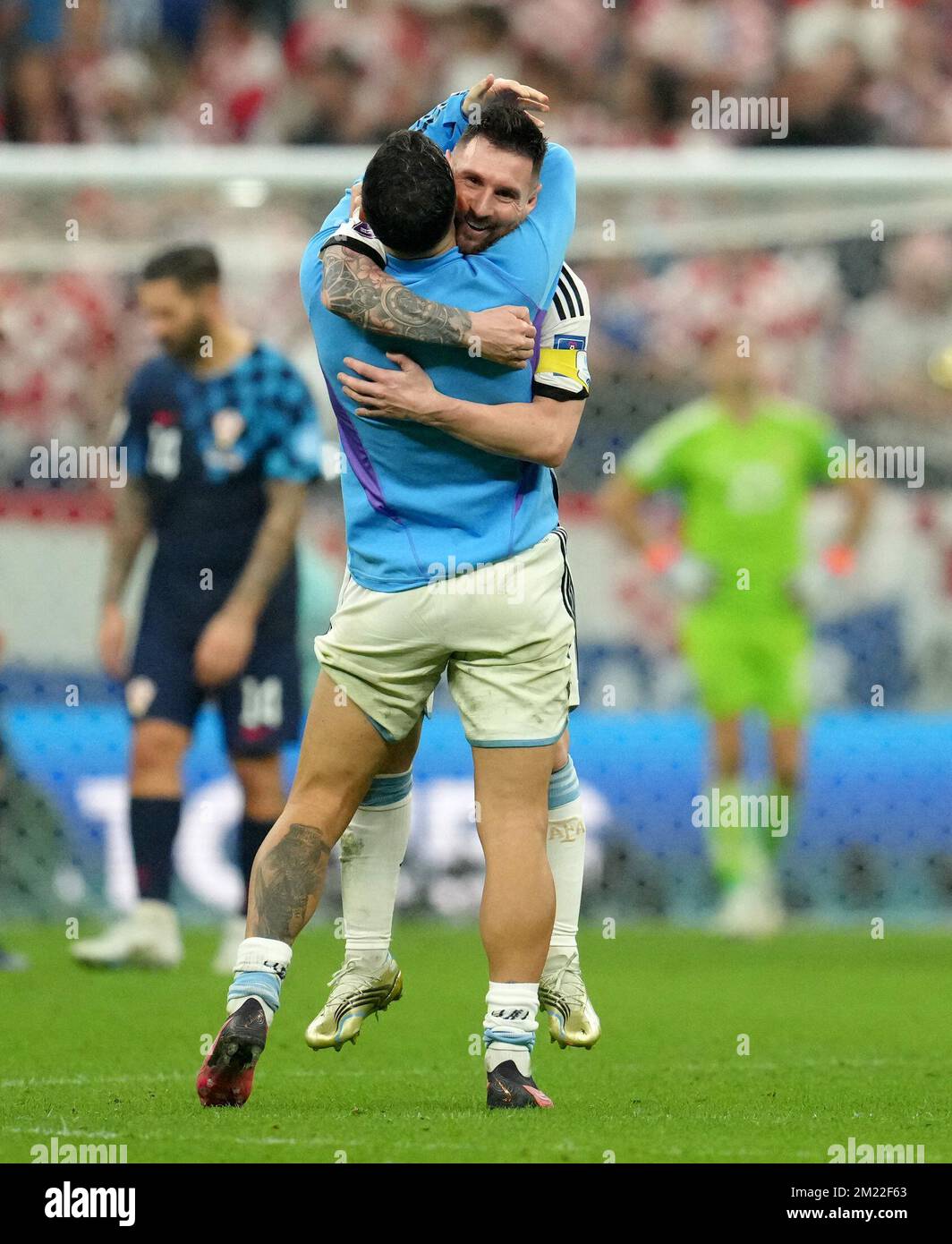 Argentina's Lionel Messi (facing) celebrates after the FIFA World Cup ...