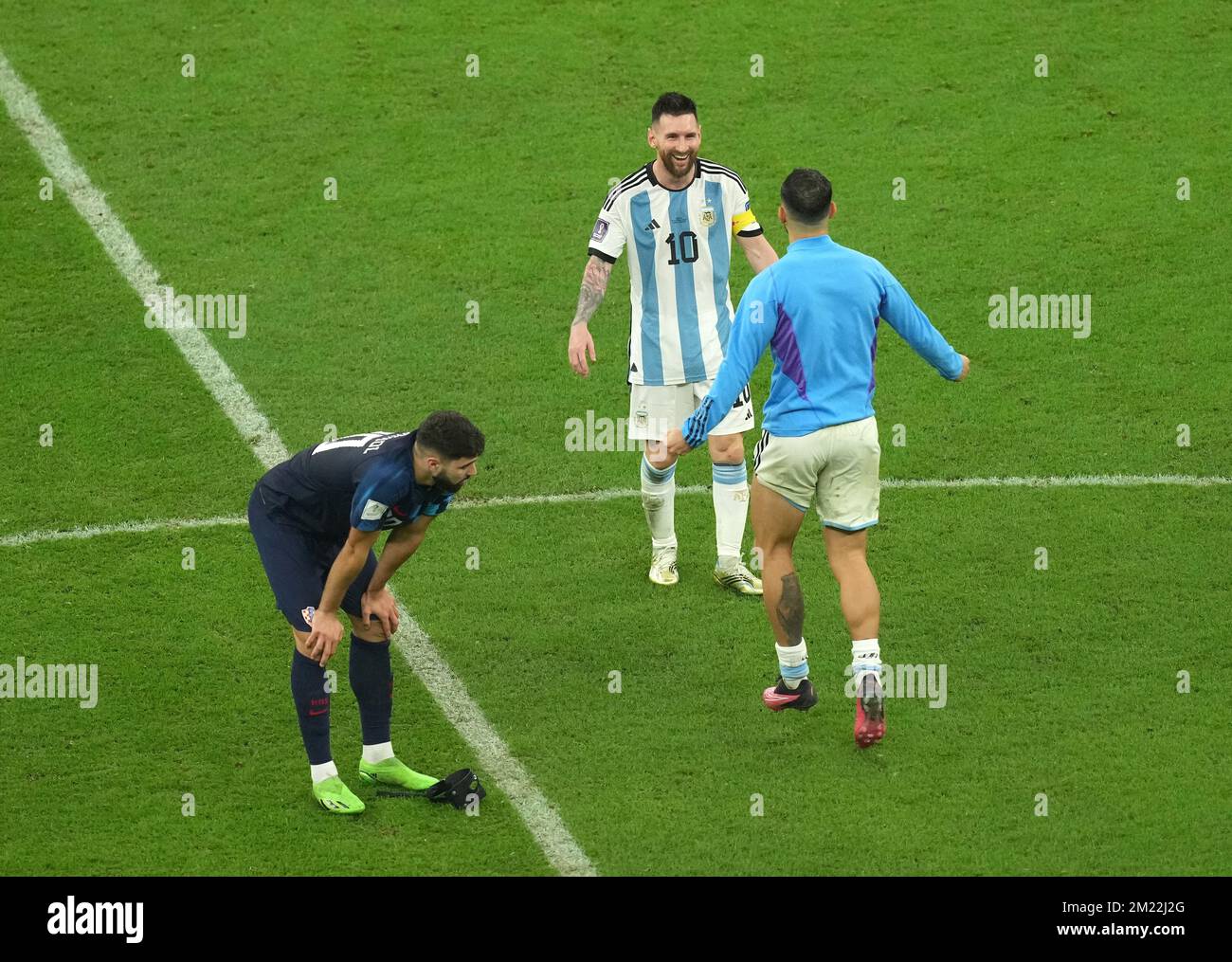 Croatia's Josko Gvardiol dejected as Argentina's Lionel Messi ...