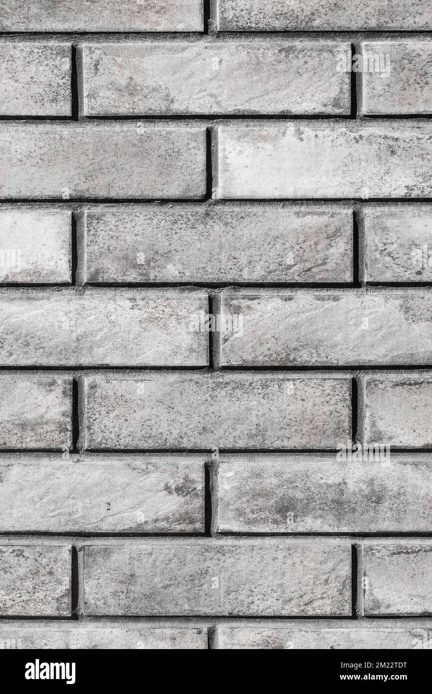 Modern gray abstract brick vertical wall urban facade interior texture ...