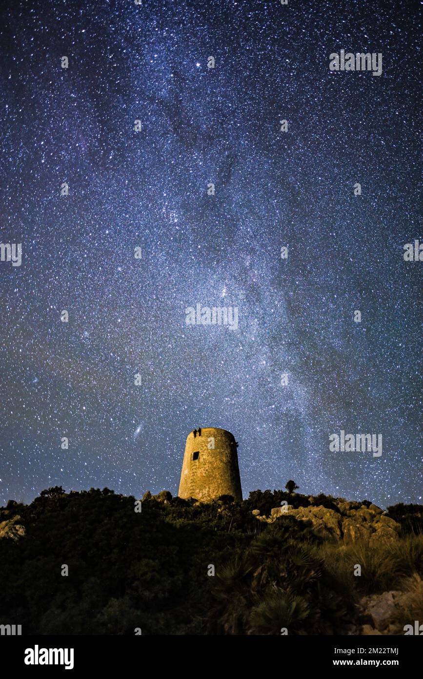 Night shot of milky way above the Albercutx watch tower, Alcudia ...