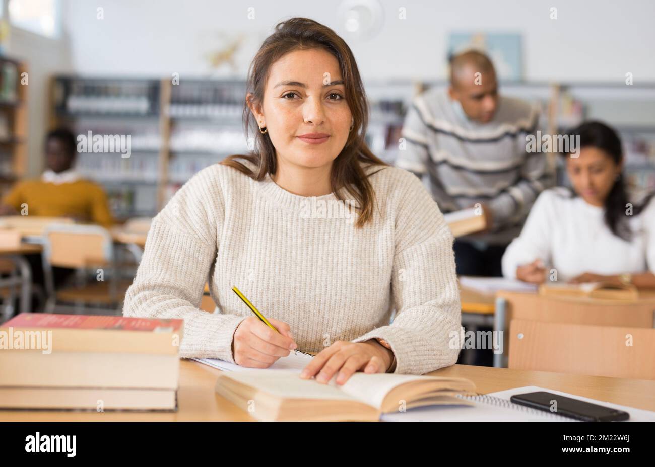 Diverse people studying in adult hi-res stock photography and images ...