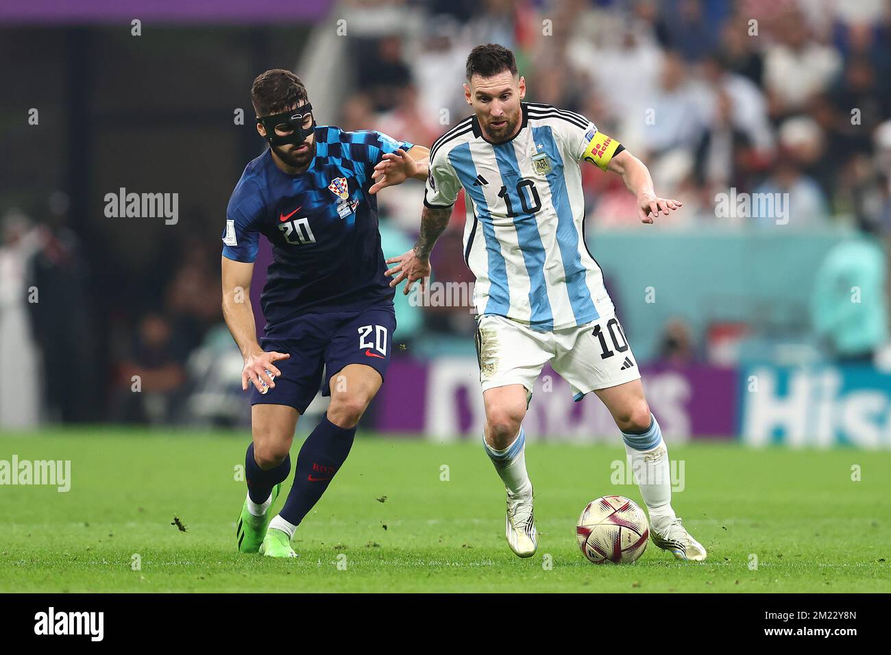 Doha, Qatar. 13th Dec, 2022. Lionel Messi (R) of Argentina in action ...