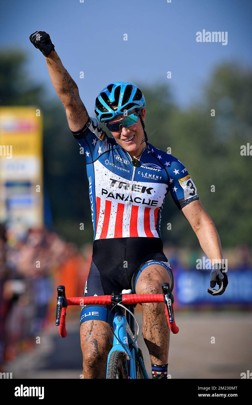 US Katie Compton celebrates as she crosses the finish line at the ...