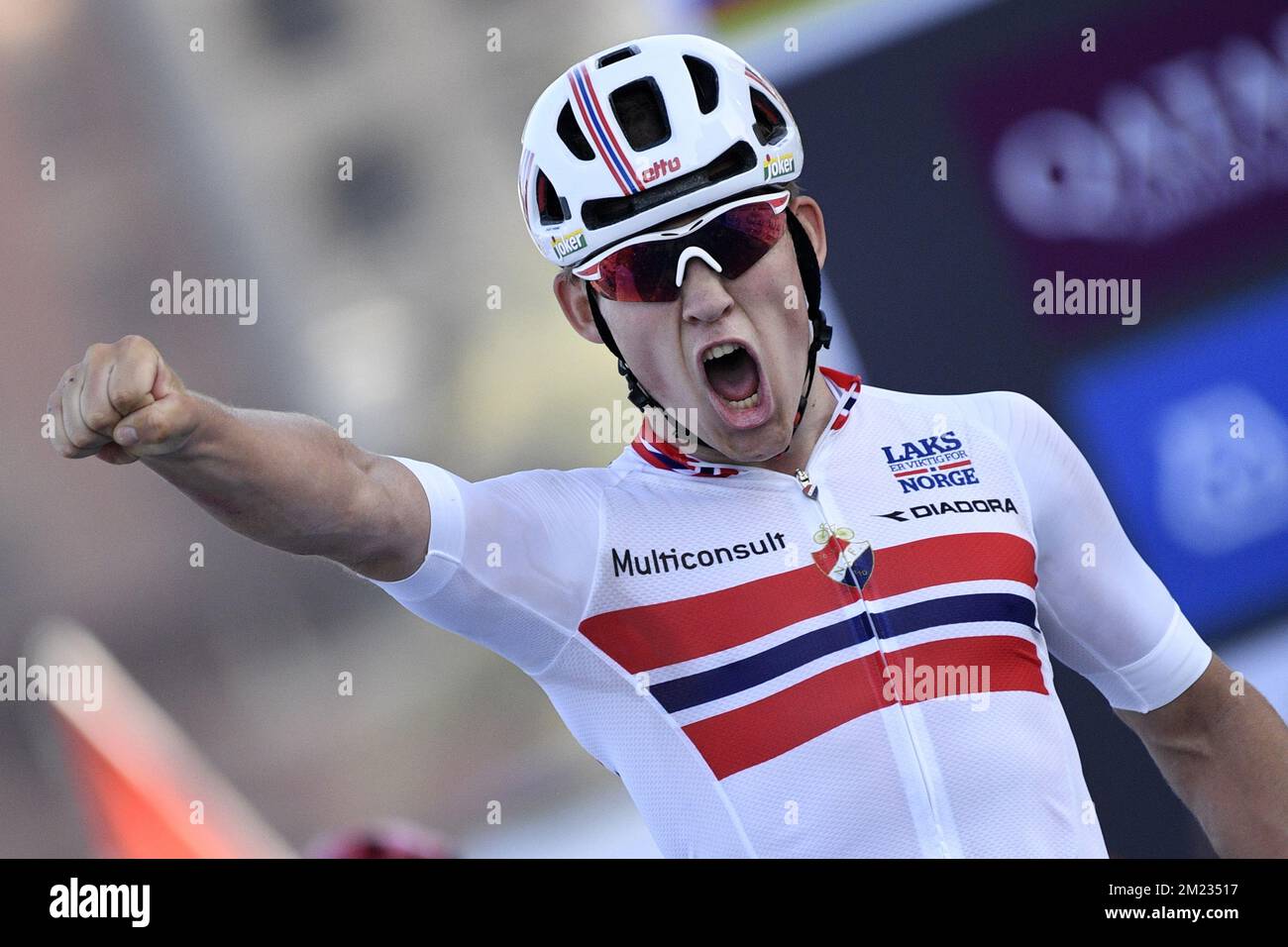 Norwegian Kristoffer Halvorsen celebrates as he crosses the finish line ...