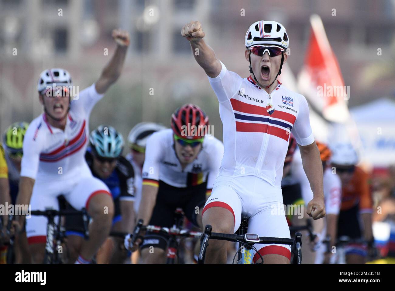Norwegian Kristoffer Halvorsen celebrates as he crosses the finish line ...