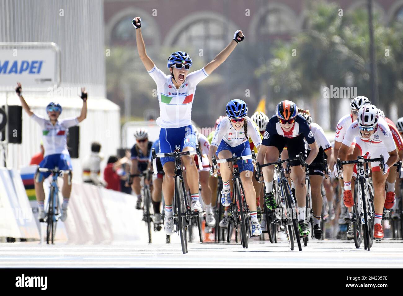 Italian Elisa Balsamo celebrates as she crosses the finish line to win ...
