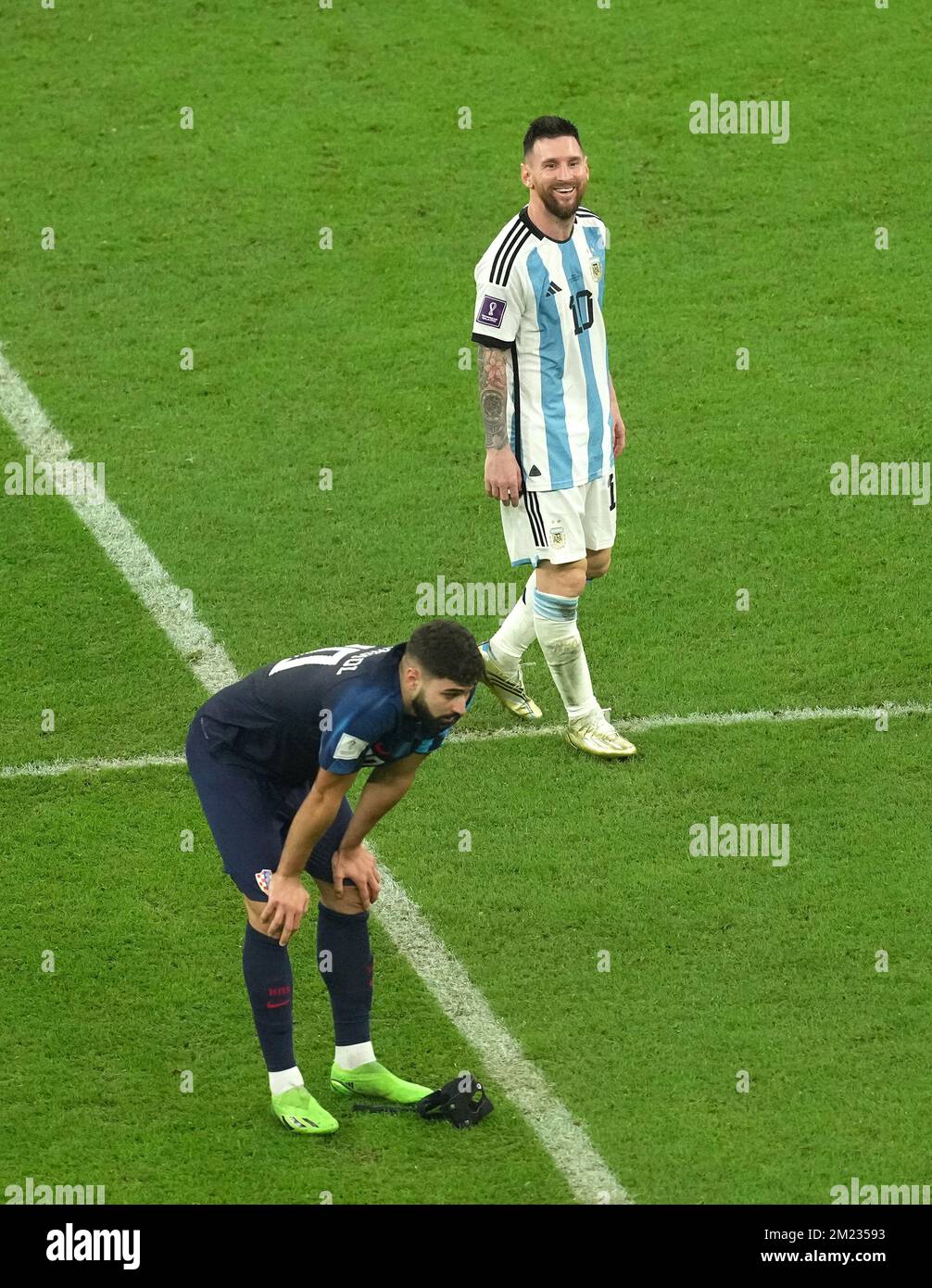Croatia's Josko Gvardiol dejected as Argentina's Lionel Messi ...