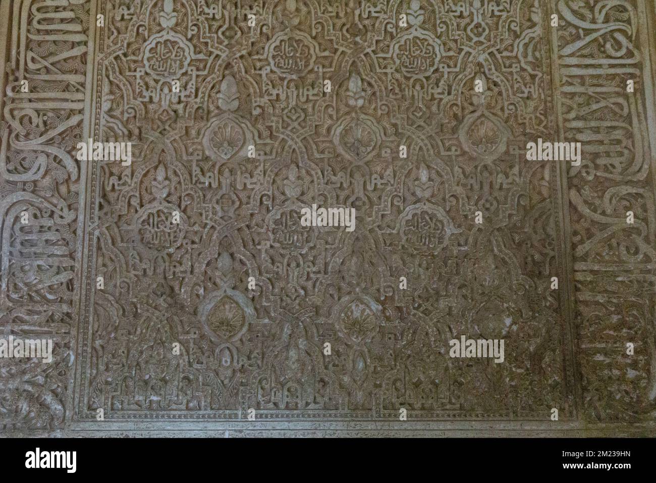 Close up to an arabic patterns relief on the roof of alhambra palace ...