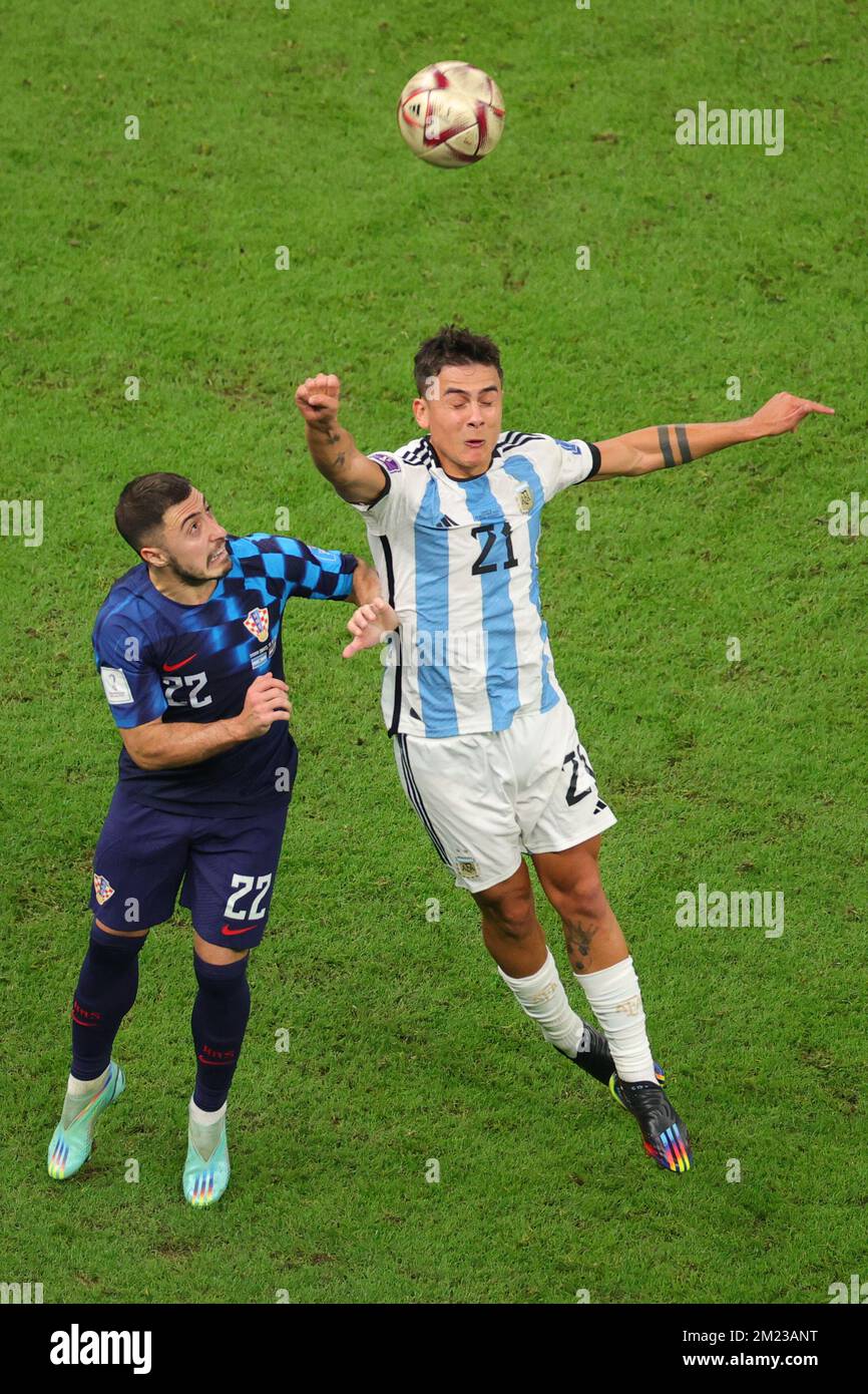 Lusail, Qatar. 13th Dec, 2022. Josip Juranovic of Croatia and Paulo ...