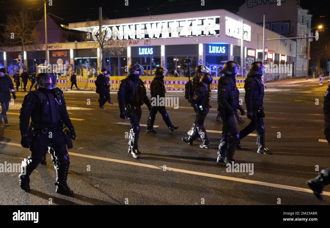 Leipzig, Germany. 13th Dec, 2022. Police officers accompany a left-wing ...
