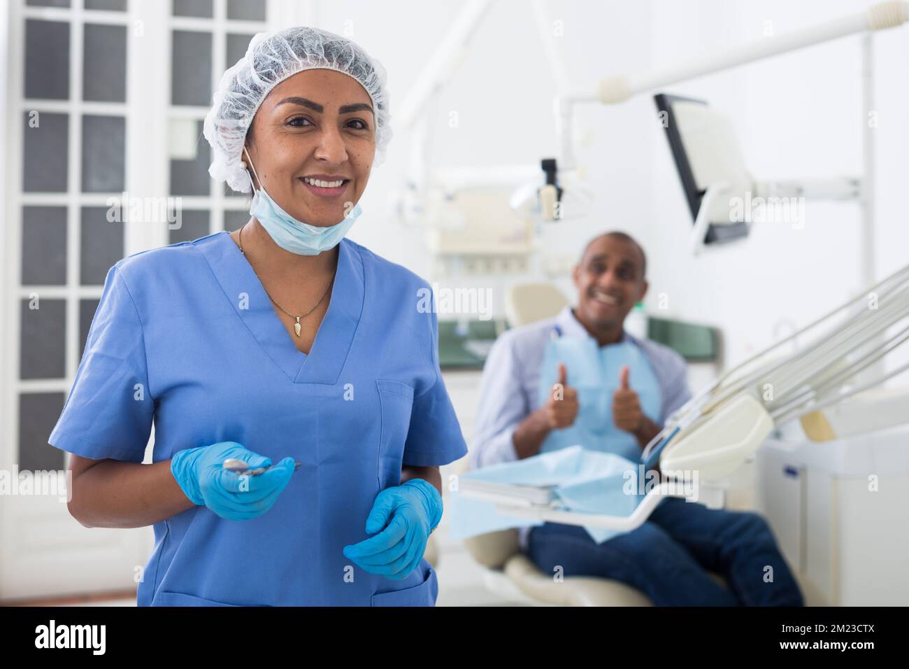 Successful professional woman dentist standing in dental office Stock ...