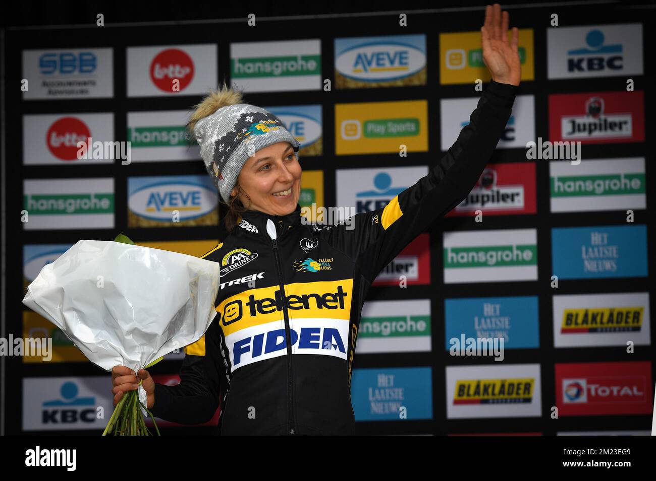 Belgian Jolien Verschueren celebrates on the podium after the 4th stage ...