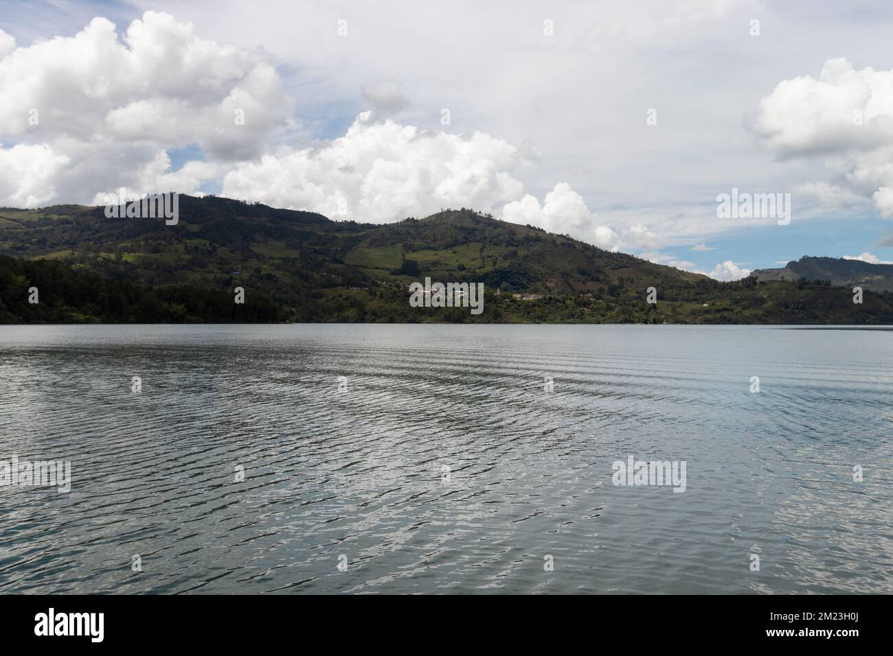 Colombian guavio region landscape viewed from a mountain with crops ...