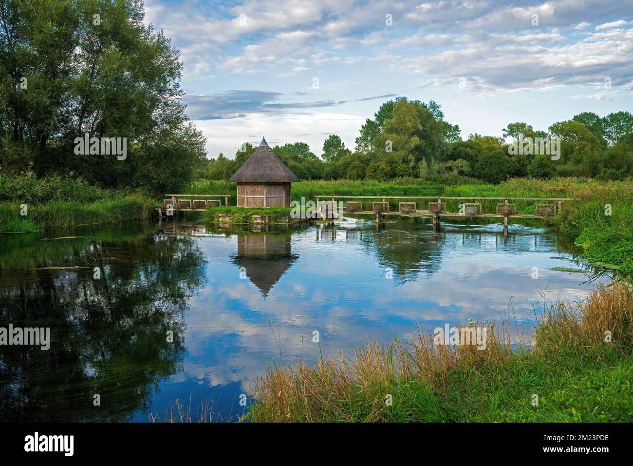 Fisherman's hut and eel traps across the River Test on the Leckford ...
