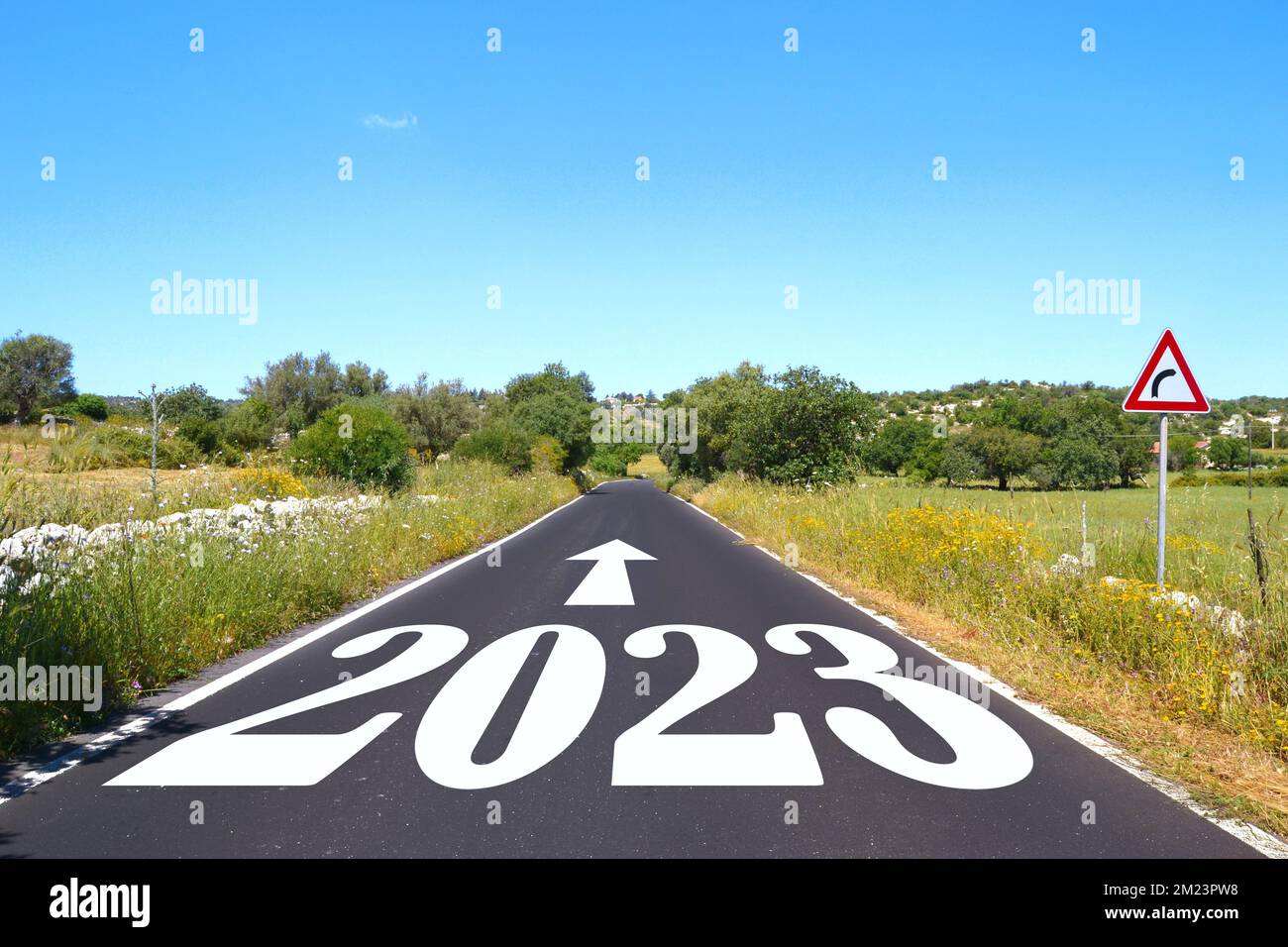 paved road without a toll and road sign on the right side Stock Photo ...